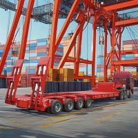 China Custom's Requirement Semi-Trailer Red Lowbed Trailer 3 Axle Low Bed Loader 60 Ton Lowboy for sale