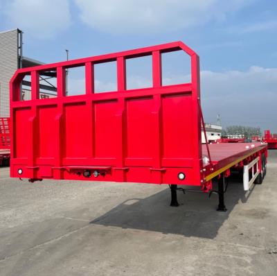 China Tare Weight 7.0 Ton 3 Axle 40-120ton Capacity Flatbed Semi Trailer with Twist Lock for sale