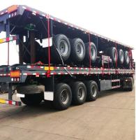 China 3 Axle 4 Axle Flat Bed 20 Feet 40 Feet 45 Feet Container Flatbed Truck Semi Trailer for sale