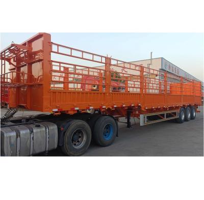 China SAF Two Speed 28t Heavy Duty Landing Gear 4 Axle Leaf Spring Fence Cargo Semi Trailer for sale