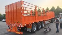 China SAF Two Speed 28t Heavy Duty Landing Gear 4 Axle Leaf Spring Fence Cargo Semi Trailer for sale