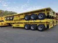 China Flatbed Semi Trailer for Container Transport 3 Axles Tire 12R22.5 12400*2610*1550mm for sale