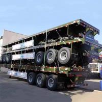 China 4 Axle 20FT 40FT Flatbed Semi Truck Trailer Container Semi Trailer with 12R22.5 Tires for sale