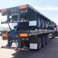 China 4 Axle 20FT 40FT Flatbed Semi Truck Trailer Container Semi Trailer with 12R22.5 Tires for sale