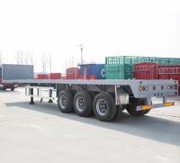 China Tare Weight 7.0 Ton 3 Axle 4 Axle Capacity 50-80Tons Flat Bed Semi Trailer for Truck for sale