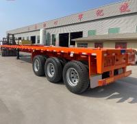 China Tare Weight 7.0 Ton 3 Axle 4 Axle Capacity 50-80Tons Flat Bed Semi Trailer for Truck for sale