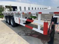 China 3 Axle 40-120ton 20ft 40ft Container Flatbed Truck Semi Trailer with 12 Twist Lock for sale