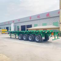 China 3 Axles 20FT 40FT Container Chassis Flat Bed Semi Truck Trailer with Steel Material for sale