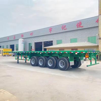 China 3 Axles 20FT 40FT Container Chassis Flat Bed Semi Truck Trailer with Steel Material for sale