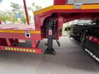 China Customized 3/4 Axles 40FT Container Timber Steel Tube Lowbed Semi Trailer for Truck for sale