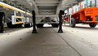 China 40 Ft 3Axles 4Axles Steel Container Trailer Flatbed Truck Semi Trailer Tire 12R22.5 for sale