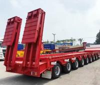 China Transportation 20-100ton Low Bed Semi Trailer with Air Suspension and Steel Material for sale