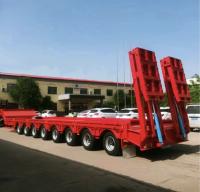 China Transportation 20-100ton Low Bed Semi Trailer with Air Suspension and Steel Material for sale