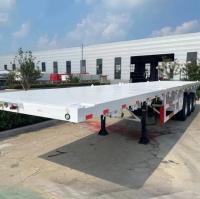 China 12400*2610*1550mm Steel Flatbed Trailer 3axle 4axle For Heavy Hauling High Durability for sale