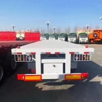 China 12400*2610*1550mm Steel Flatbed Trailer 3axle 4axle For Heavy Hauling High Durability for sale