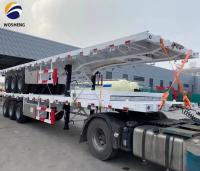 China 4 Axle Container Truck Semi Trailer 20ft 40ft Flatbed Trailer with 12R22.5 Tires for sale