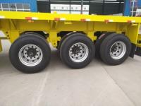China 12500x2500x1600-3100mm Semi Trailer for Container 30-70t Heavy Duty Flatbed Trailer for sale