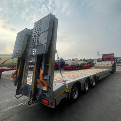 China 13000x3000x3300mm Customized 60Ton Heavy Duty Transport 3 Axles Low Bed Boy Semi-Trailer for sale
