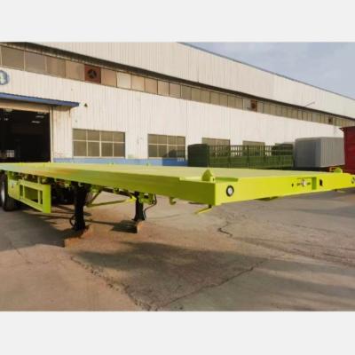 China Mechanical Suspension Flatbed Semi Trailer for 20FT 40FT Flat Bed Container Truck Trailers for sale