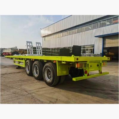 China 20ft 40ft Flat Bed Container Truck Trailers 3 4 Axles Heavy Duty Flatbed Semi Trailer for sale