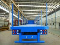 China Q345b Main Beam 3 Axles 20ft 40ft Container Transportation 60-100Tons Flat Bed Flatbed Truck Semi Trailer for sale