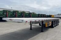 China 12 Set Twist Lock Flatbed Semi Trailer for 30T to 100ton Capacity and Truck Trailer for sale