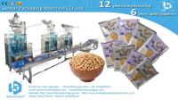 China Corn kernels 2KG pouch automatic weighing packaging machine with volumetric cup system BSTV-550BZ for sale