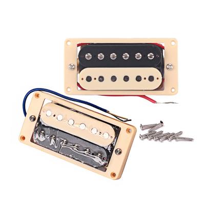 China Vintage Zebra Humbucker Pickup Double Coil With Black Cream Frame Bridge Neck Set for sale