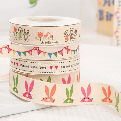 China Custom Cartoon Animal Print Cotton Ribbon 10mm-25mm Width 50 Yards Roll for Gift Packaging and Crafts for sale