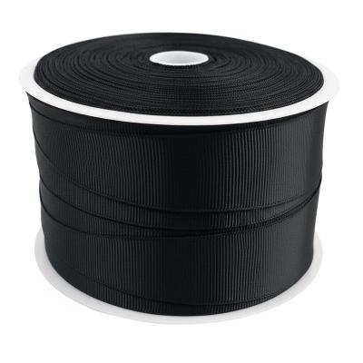 China Solid Pattern Polyester Nylon Ribbon 1 8 Inch Width High Strength Material Suitable for Multiple Industrial Applications for sale