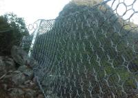 China Safety Passive Rockfall Fence with 2000 kJ Capacity - Spider Shaped Spiral Rockfall Net for Slope Protection for sale