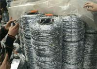 China 50kg Concertina Razor Barbed Wire with 20g Zinc Coating - Multiple Gauge Options from 12*12 to 15-1/2*15-1/2 for sale