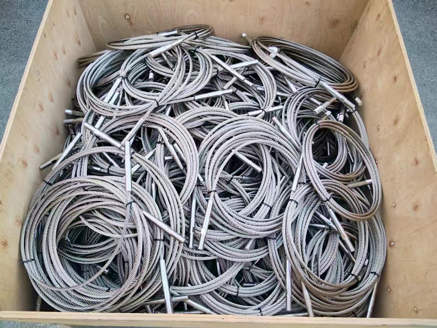 Bulk packed stainless steel wire rope slings with swaged threaded stud terminals in export wooden crate