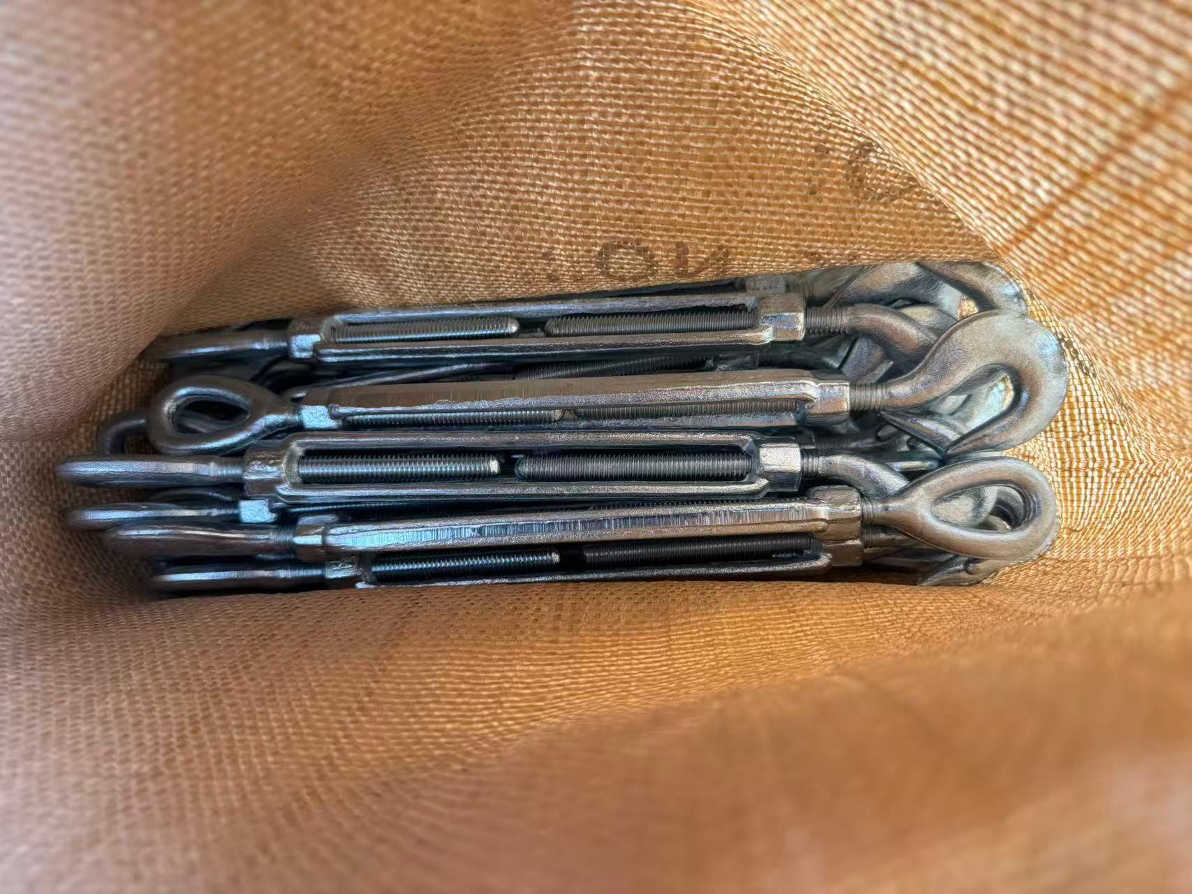 Bulk packed electric galvanized hook and eye turnbuckles in heavy duty woven bag ready for export