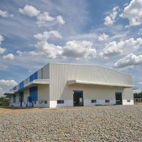 China Modular Design Steel Structure Prefab Warehouse With Rolling Door Aluminum Window for sale