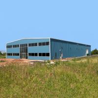 China Modular Design Steel Structure Prefab Warehouse With Rolling Door Aluminum Window for sale