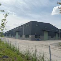 China Q235 Q355 Prefabricated Steel Warehouse Buildings Customized Size Earthquake Proof for sale