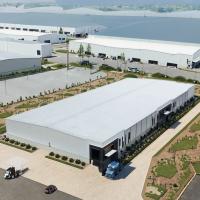 China Modular Design Steel Structure Prefab Warehouse With Rolling Door Aluminum Window for sale