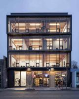 China Multi Story Commercial Metal Buildings Prefabricated Steel Frame Building Custom Design for sale