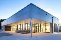 China Commercial Store Steel Structure Building Prefab Steel Frame Building Quick Assembly for sale