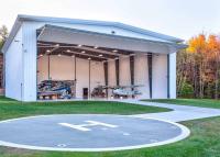 China Large Structural Steel Aircraft Hangar Construction Custom Metal Storage Sheds Anti Wind for sale