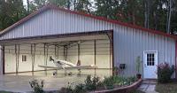 China Large Structural Steel Aircraft Hangar Construction Custom Metal Storage Sheds Anti Wind for sale