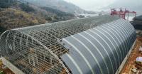 China Large-span arched prefabricated steel structure coal shed for bulk coal storage and handling for sale