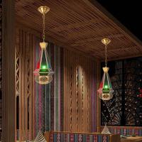 China Moroccan Exotic Style Xinjiang Restaurant Lamp Hotel Homestay Hollow Carved Brass Glass Pendant Lamp for sale
