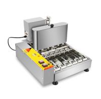 China Sweet Shop 4 Rows 1080pcs/H Automatic Donut Making Machine for sale