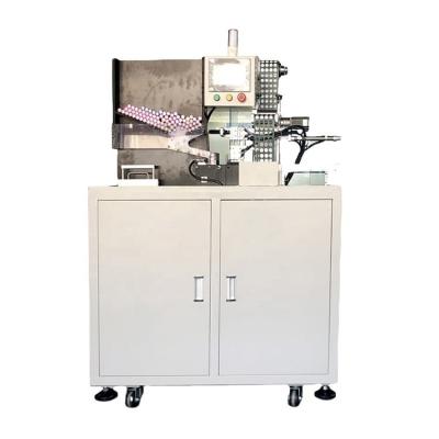 China Automated Battery Cell Sticking Machine for 18650 21700 32650 AA AAA - 4800pcs/Hour 1500W for sale