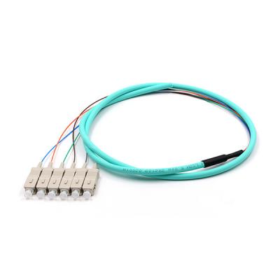 China SC UPC 6-Core PVC Bundle Fan-Out Fiber Optic Pigtail Multimode OM3 50/125μm Aqua Jacket for sale