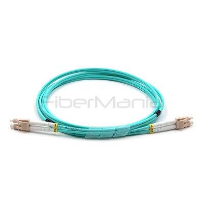 China LC UPC Duplex OM3 LSZH Aqua Jacket Armored Optical Fiber Patch Cord for sale