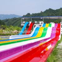 China Multi Lane Rainbow Water Slide Fiberglass Rainbow Wavy Water Park for sale