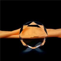 China Popular Faceted Cut Round Shape Crystal Paperweight With Engraved Logo for sale